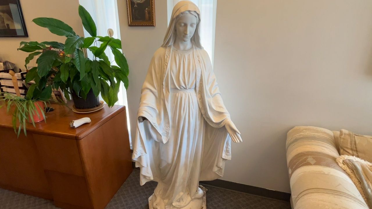 Stolen statue returned to Divine Mercy Parish