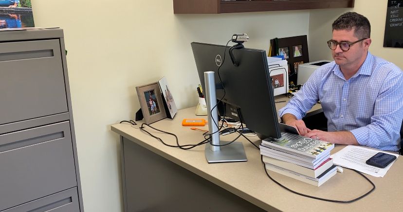 Professor working to train aspiring teachers