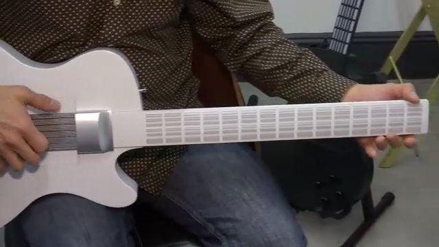 'Magic Instruments Guitar' Lets You Play Chords Using a Single Finger
