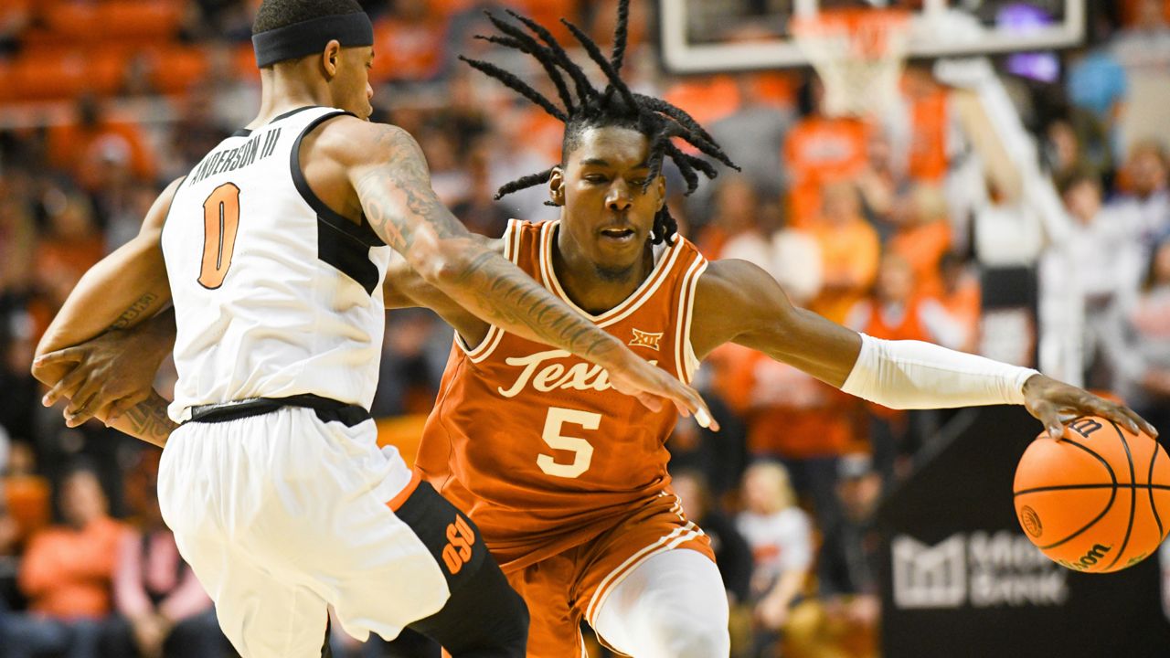 Carr, tough defense push No. 6 Texas past Oklahoma St. 56-46