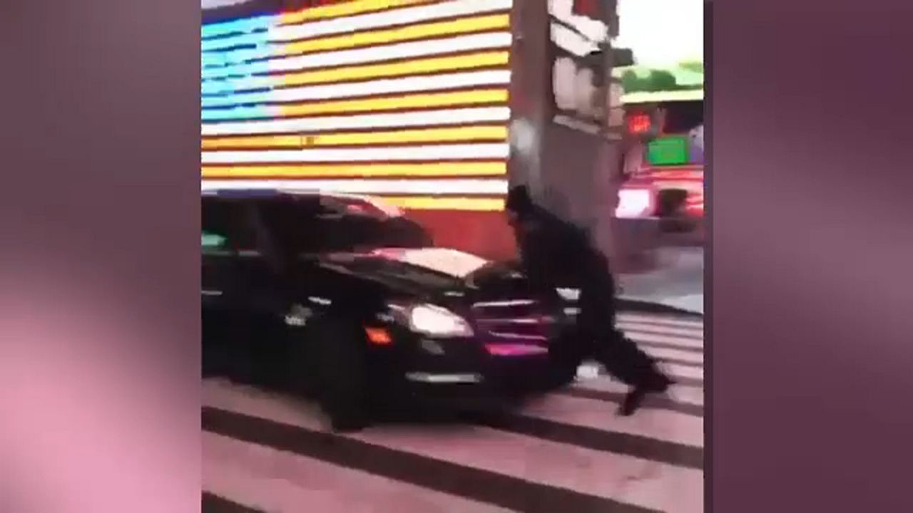 Bail set at $100K for driver accused of hitting police officer in Times ...