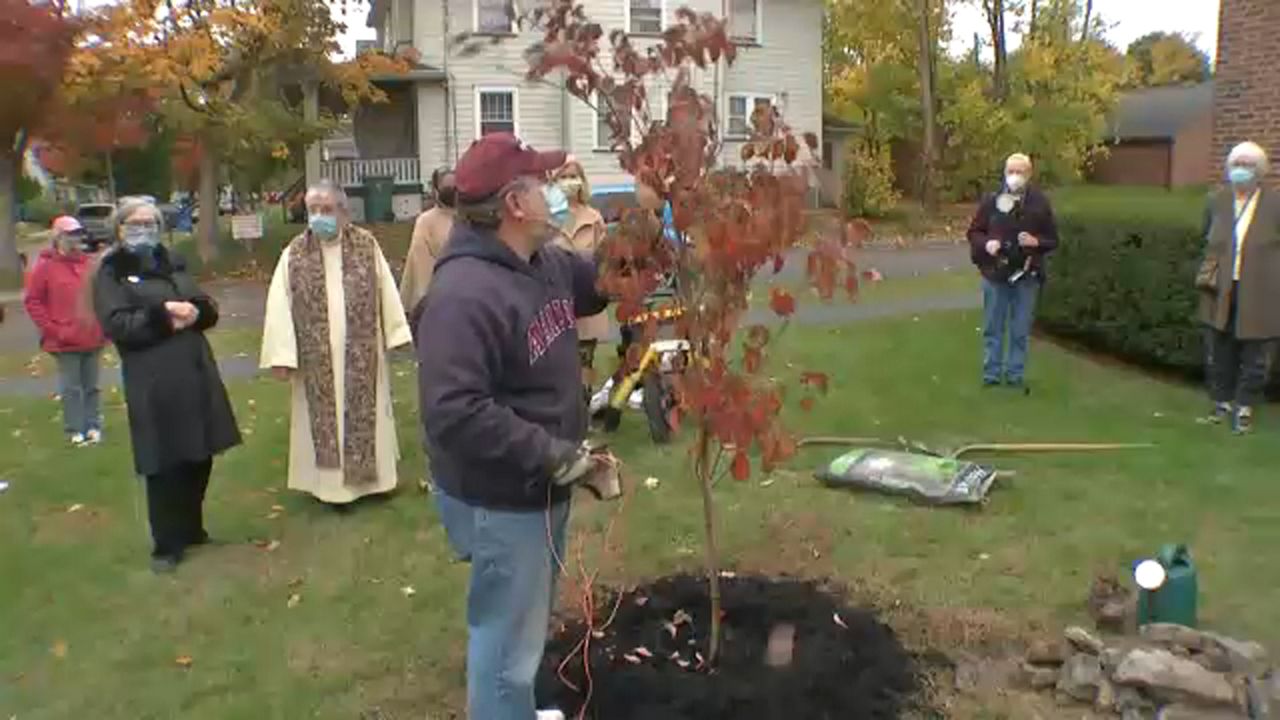 Rochester Church Plants Tree To Commemorate Lives Lost