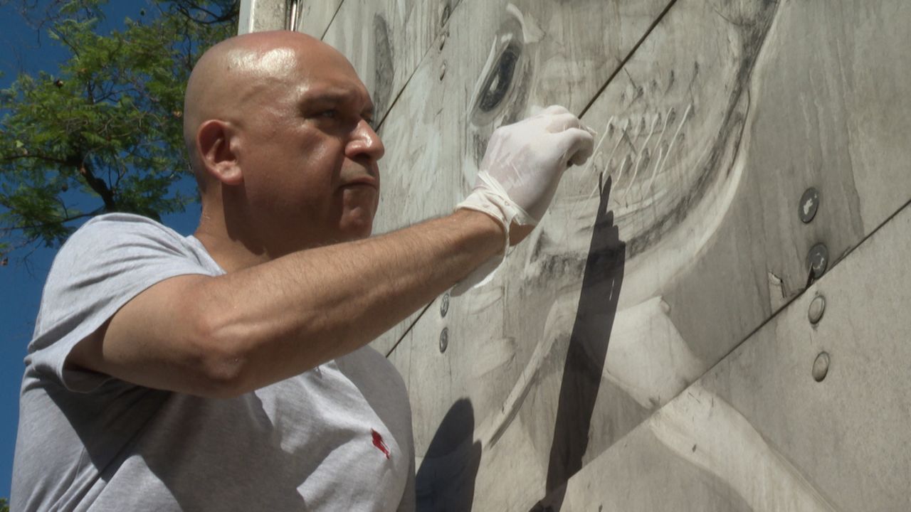 Truck Driver Uses Soot to Create Art