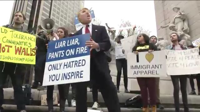 Demonstrators Protest Donald Trump in Midtown