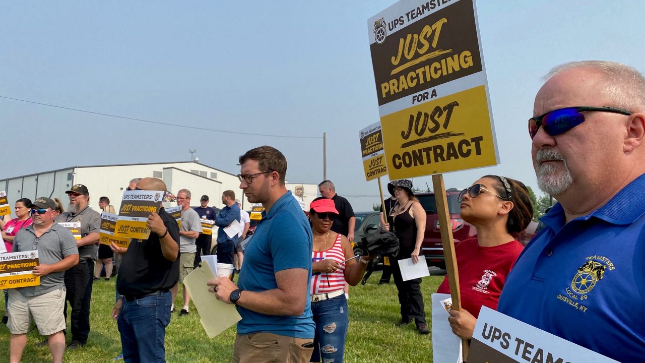 UPS employees practice picketing