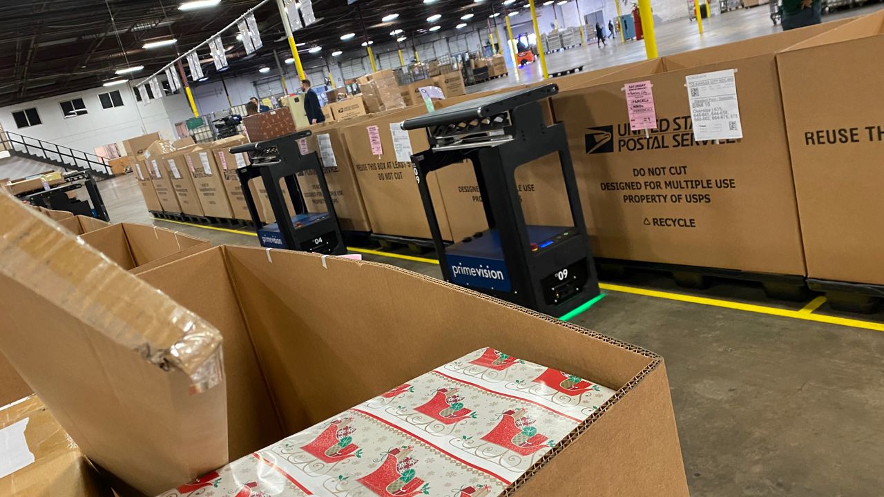 Robots move holiday packages at USPS North Texas