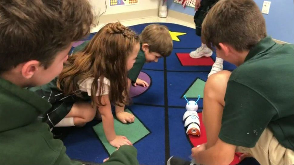 Pre-K students learning basics of coding, programming