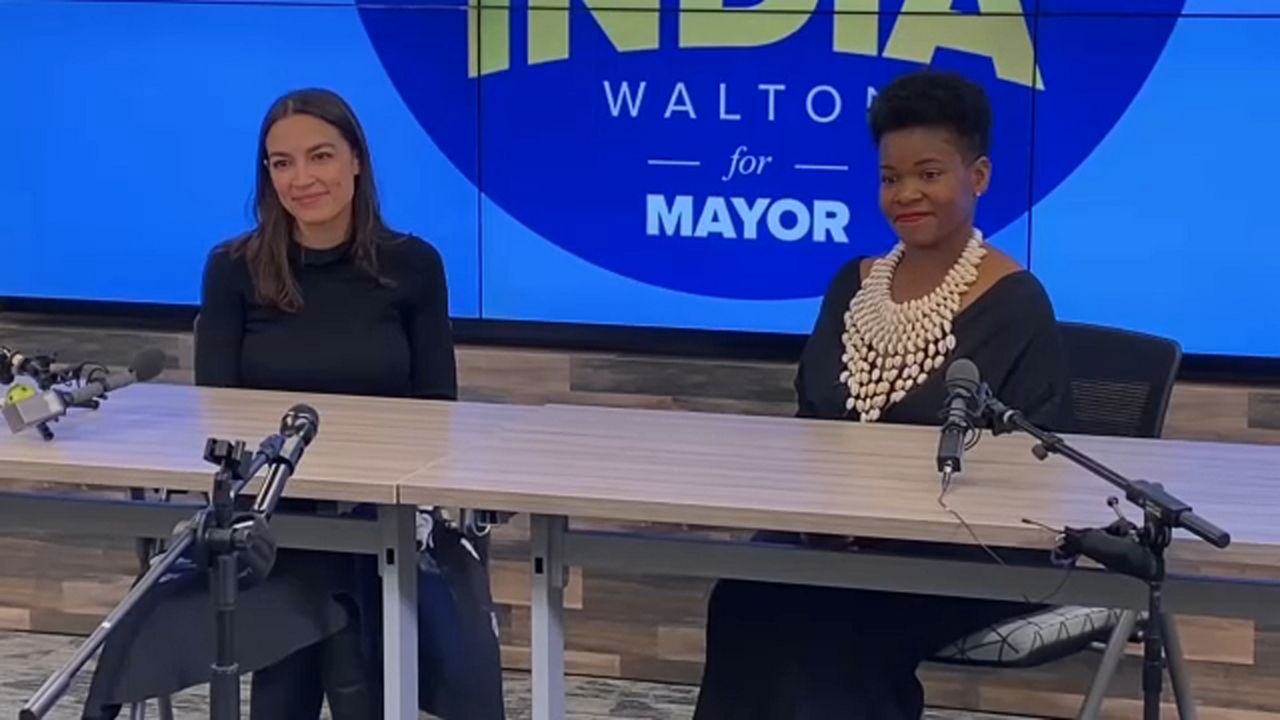 AOC, Walton speak before early voting rally