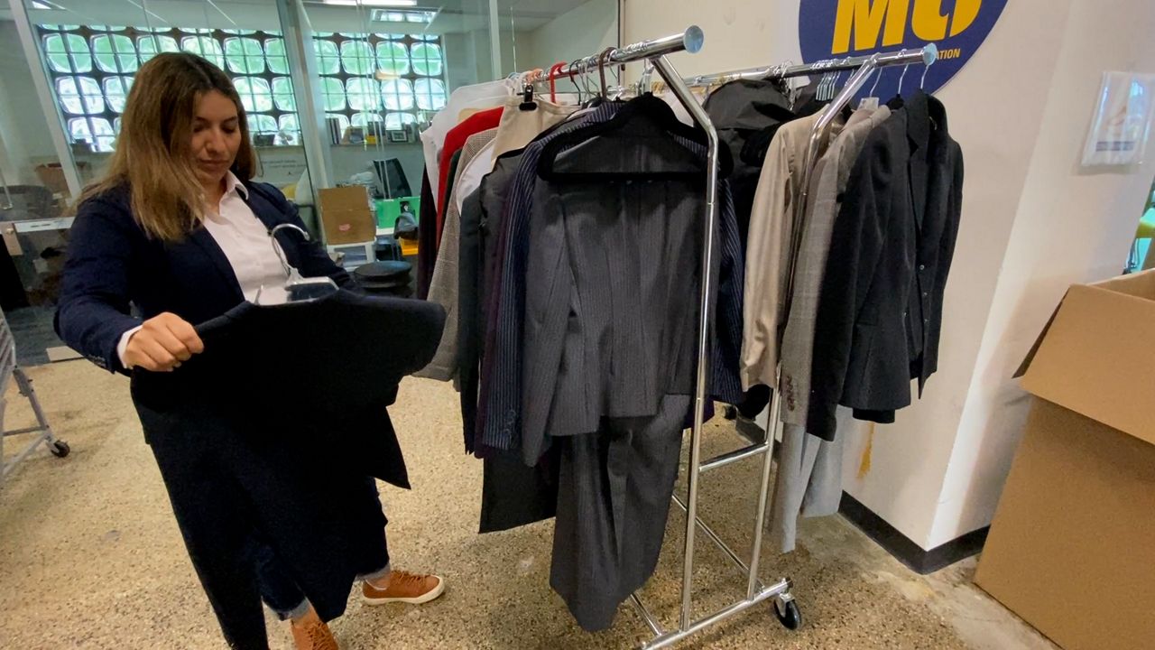 Student donates professional clothes to low-income students