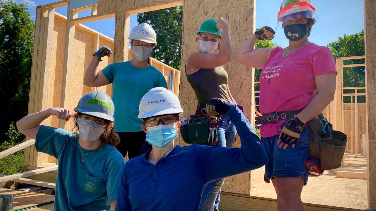 Women build home for those in need