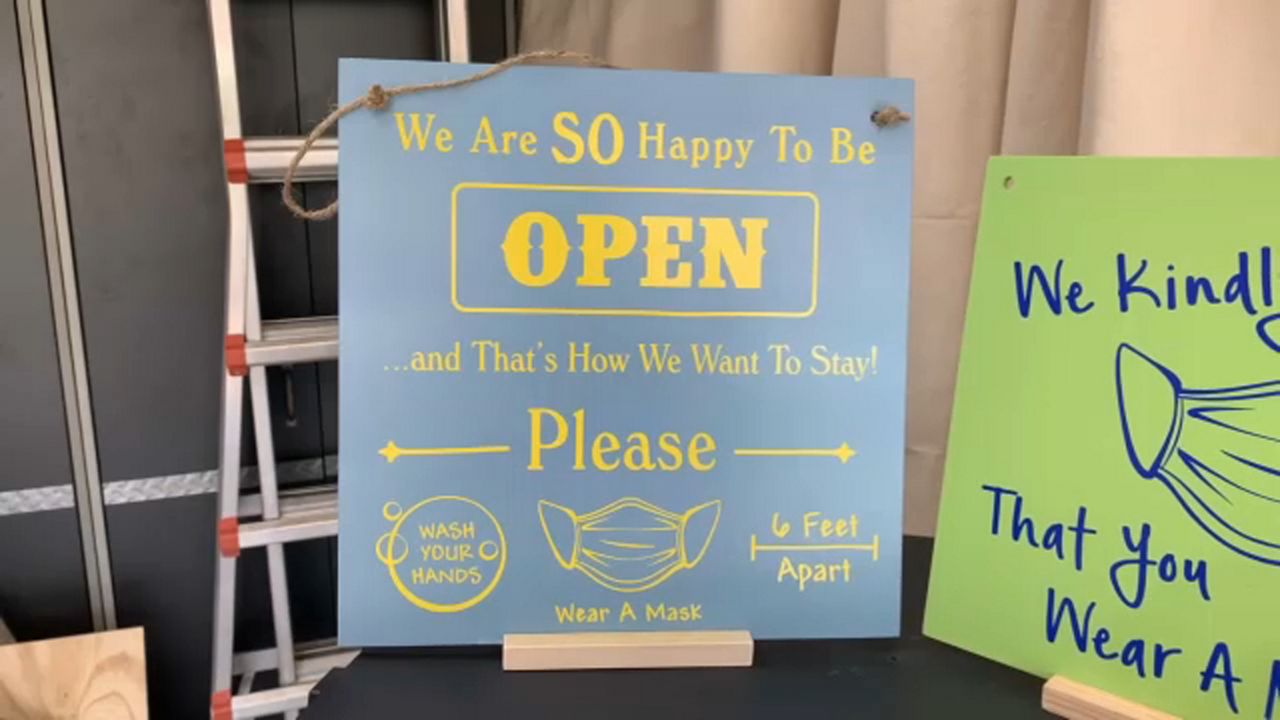 Fairport Wood Shop Making Health Safety Signs for Reopening Businesses